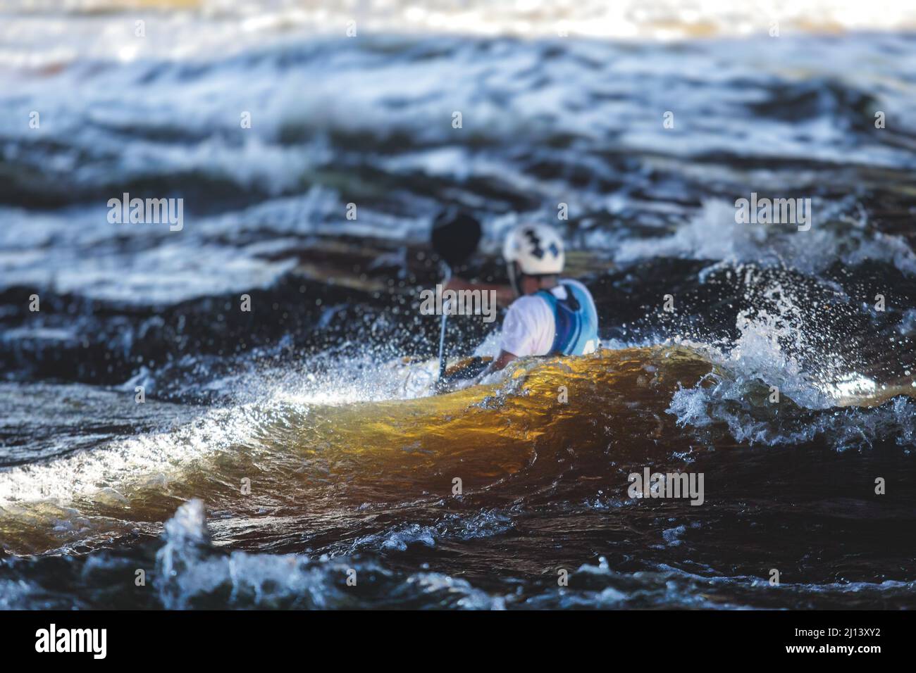 Kayak slalom canoe race in white water rapid river, process of kayaking ...