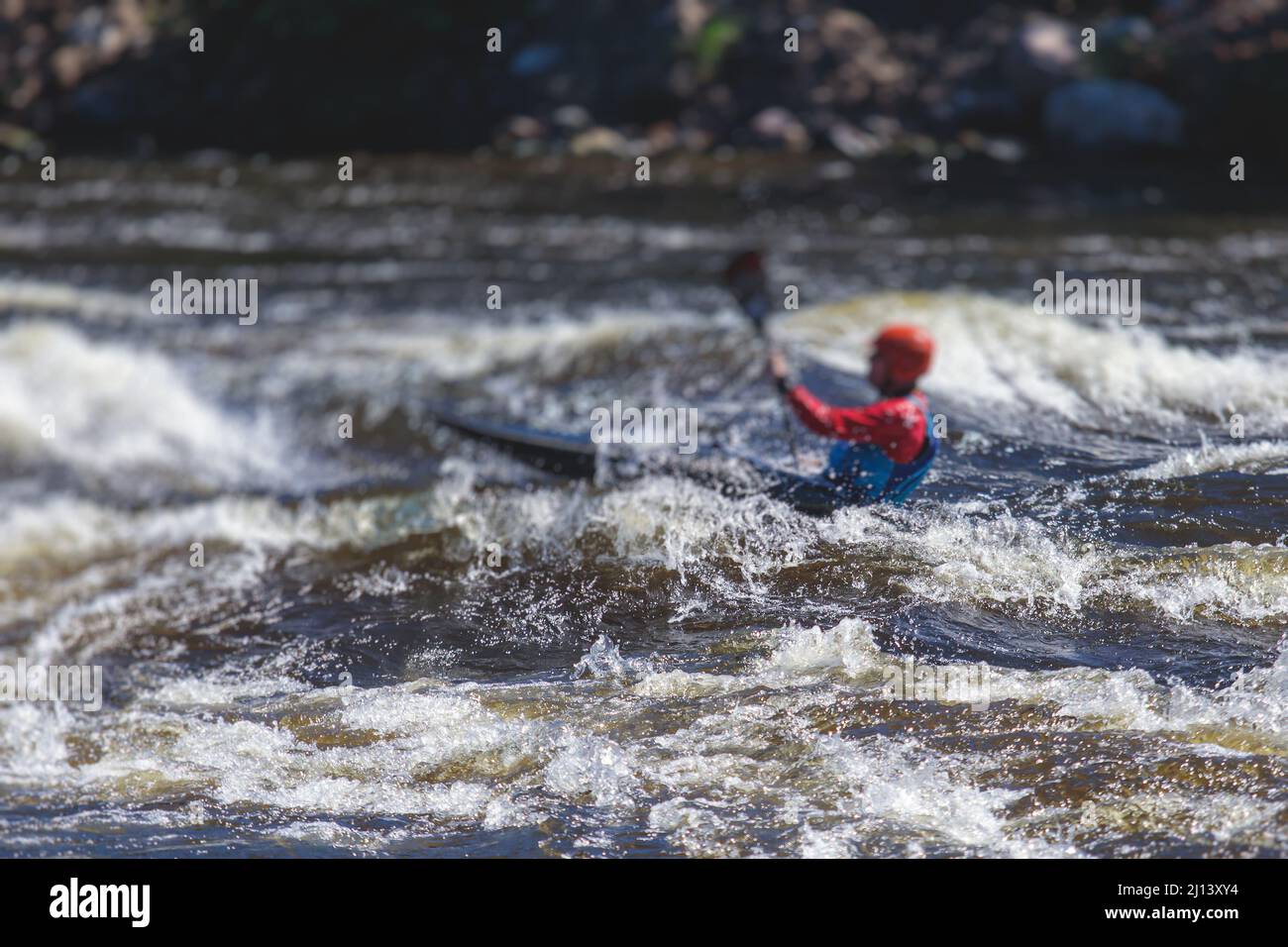 Kayak slalom canoe race in white water rapid river, process of kayaking ...