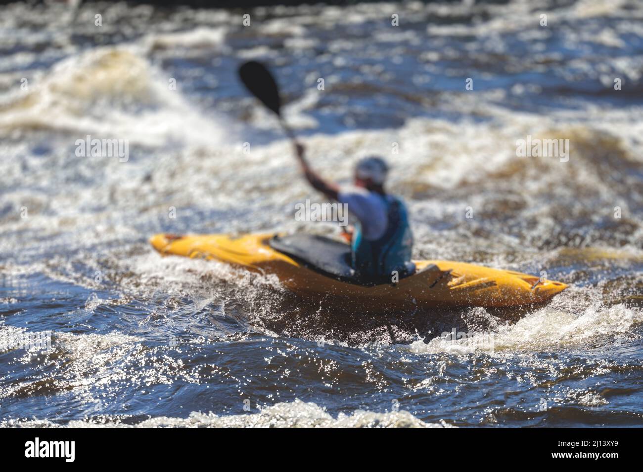 Kayak slalom canoe race in white water rapid river, process of kayaking ...