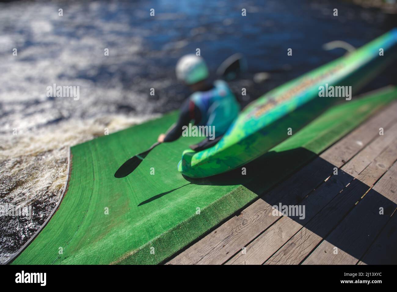 Kayak slalom canoe race in white water rapid river, process of kayaking ...