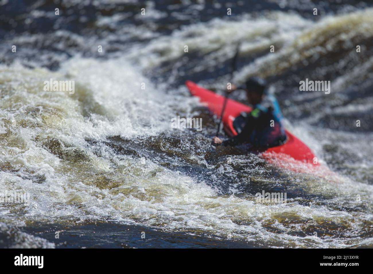 Kayak slalom canoe race in white water rapid river, process of kayaking ...