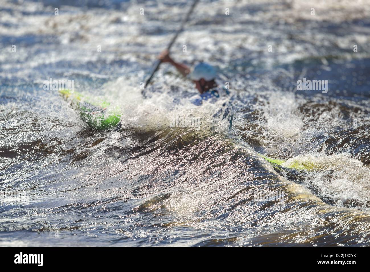 Kayak slalom canoe race in white water rapid river, process of kayaking ...