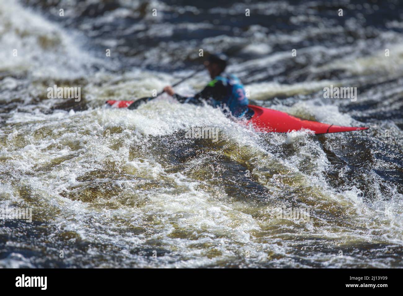 Kayak slalom canoe race in white water rapid river, process of kayaking ...