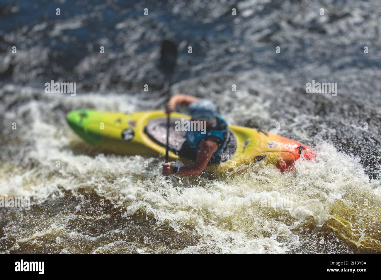 Kayak slalom canoe race in white water rapid river, process of kayaking ...