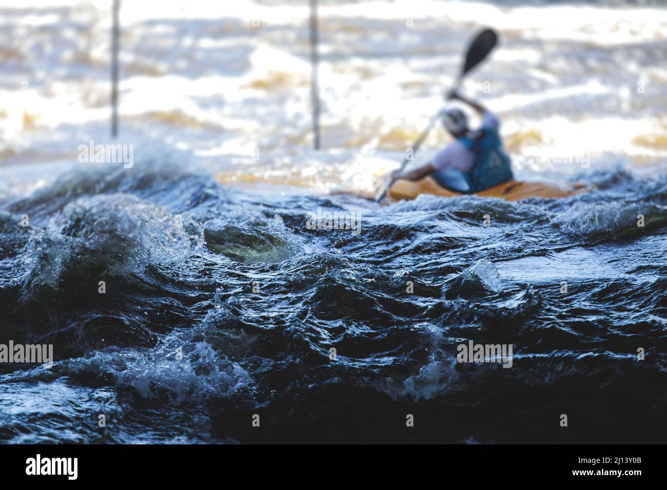 Kayak slalom canoe race in white water rapid river, process of kayaking ...