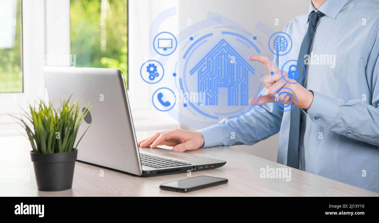 Businessman hold house icon.Smart home controlled, intelligent house ...