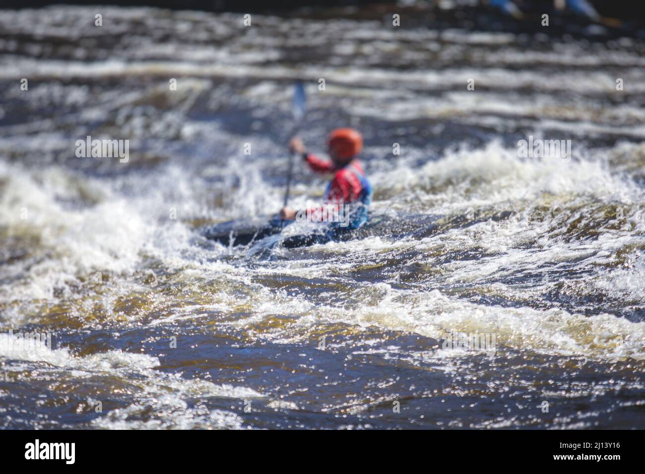 Kayak slalom canoe race in white water rapid river, process of kayaking ...