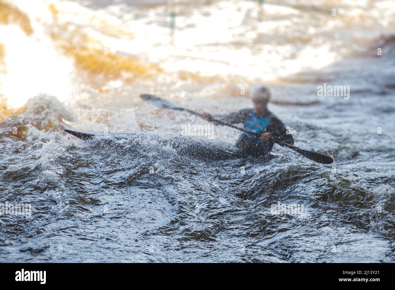 Kayak slalom canoe race in white water rapid river, process of kayaking ...