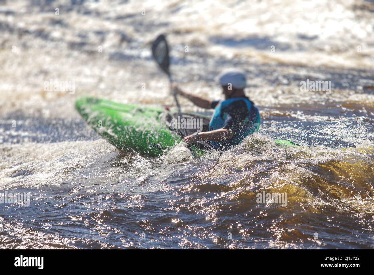 Kayak slalom canoe race in white water rapid river, process of kayaking ...