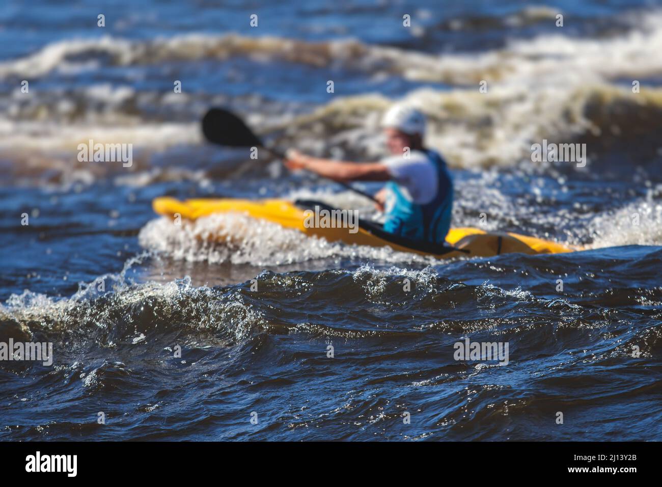 Kayak slalom canoe race in white water rapid river, process of kayaking ...