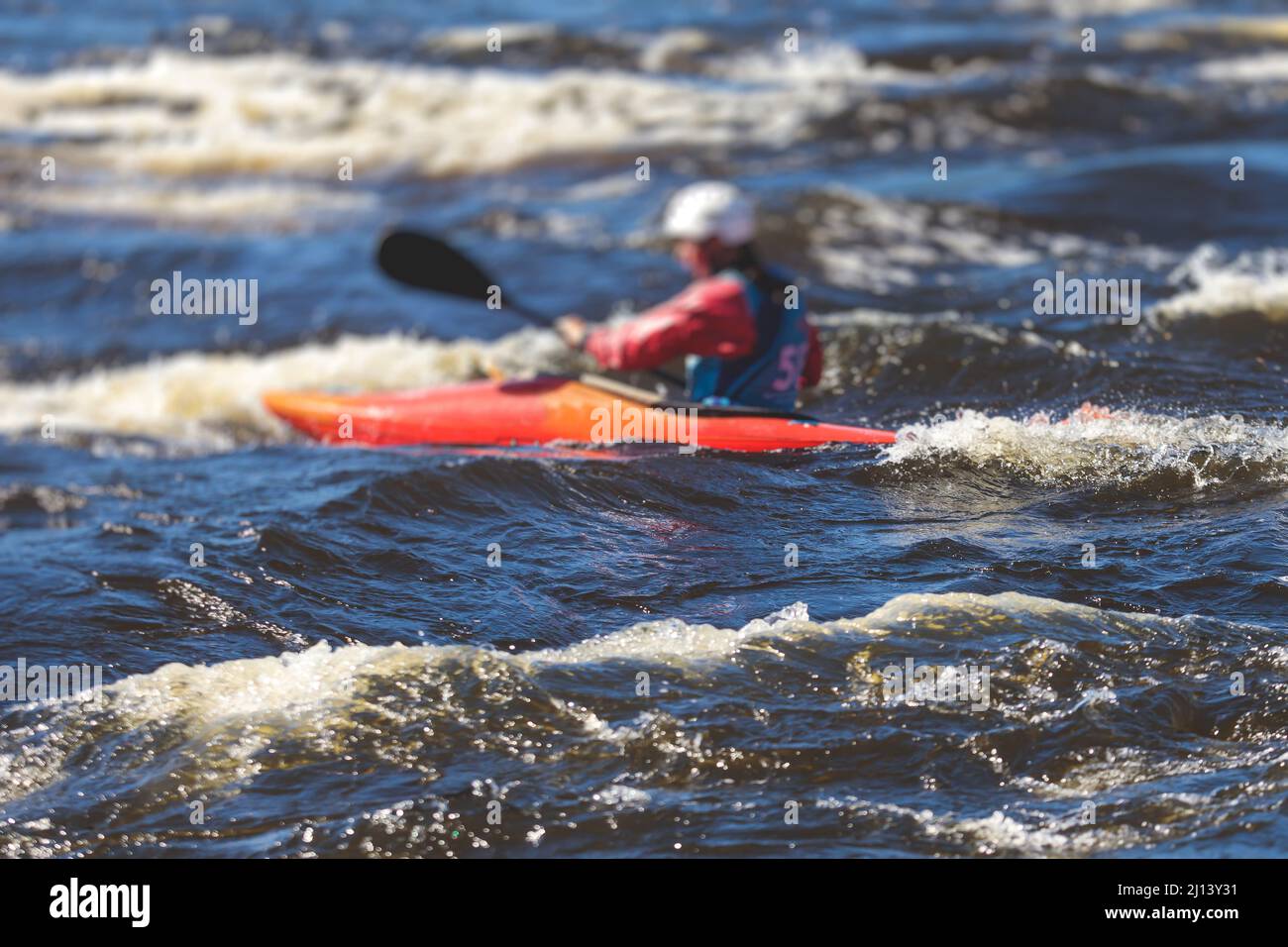 Kayak slalom canoe race in white water rapid river, process of kayaking ...