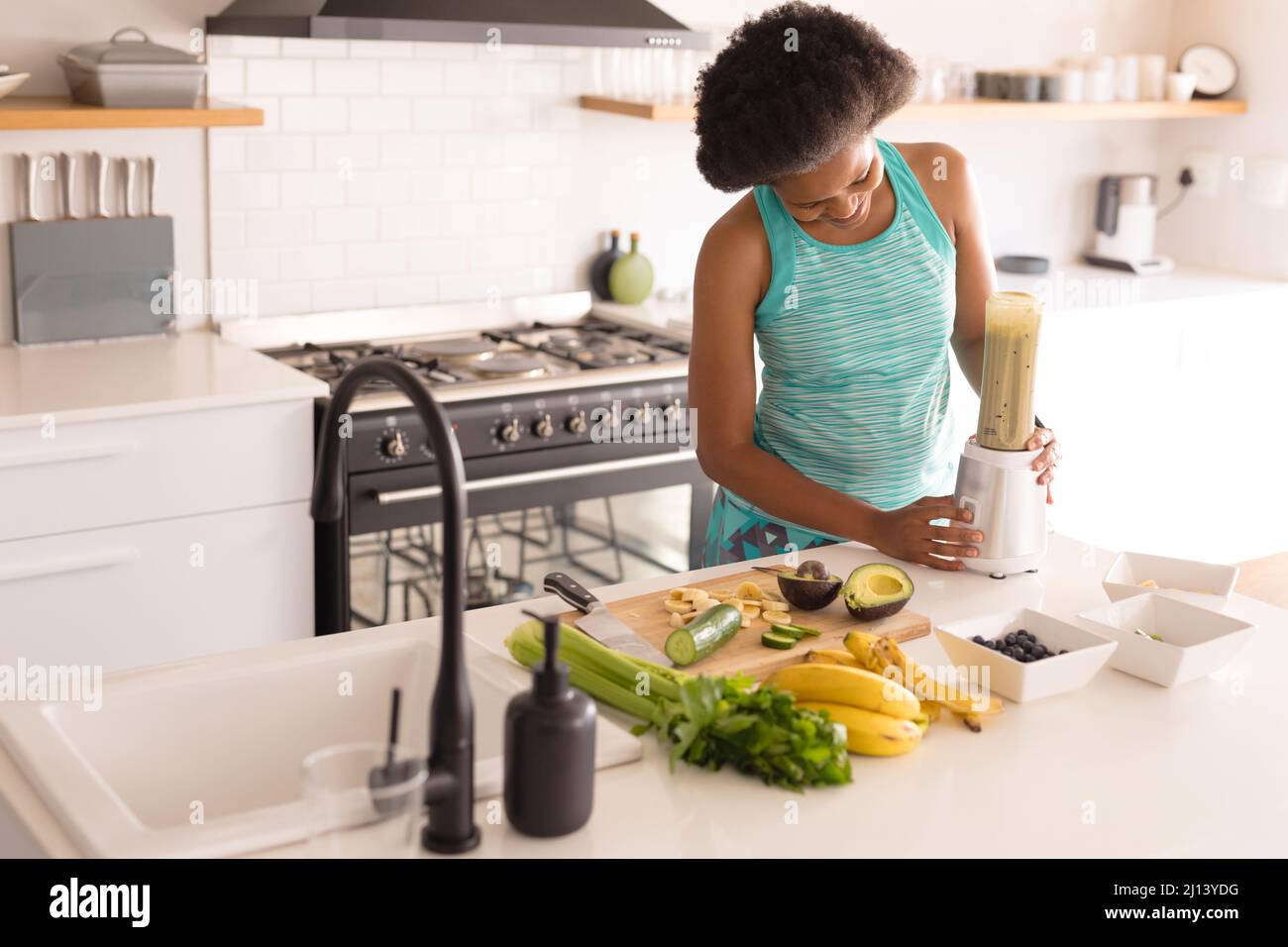 African woman eating breakfast in hi-res stock photography and images ...