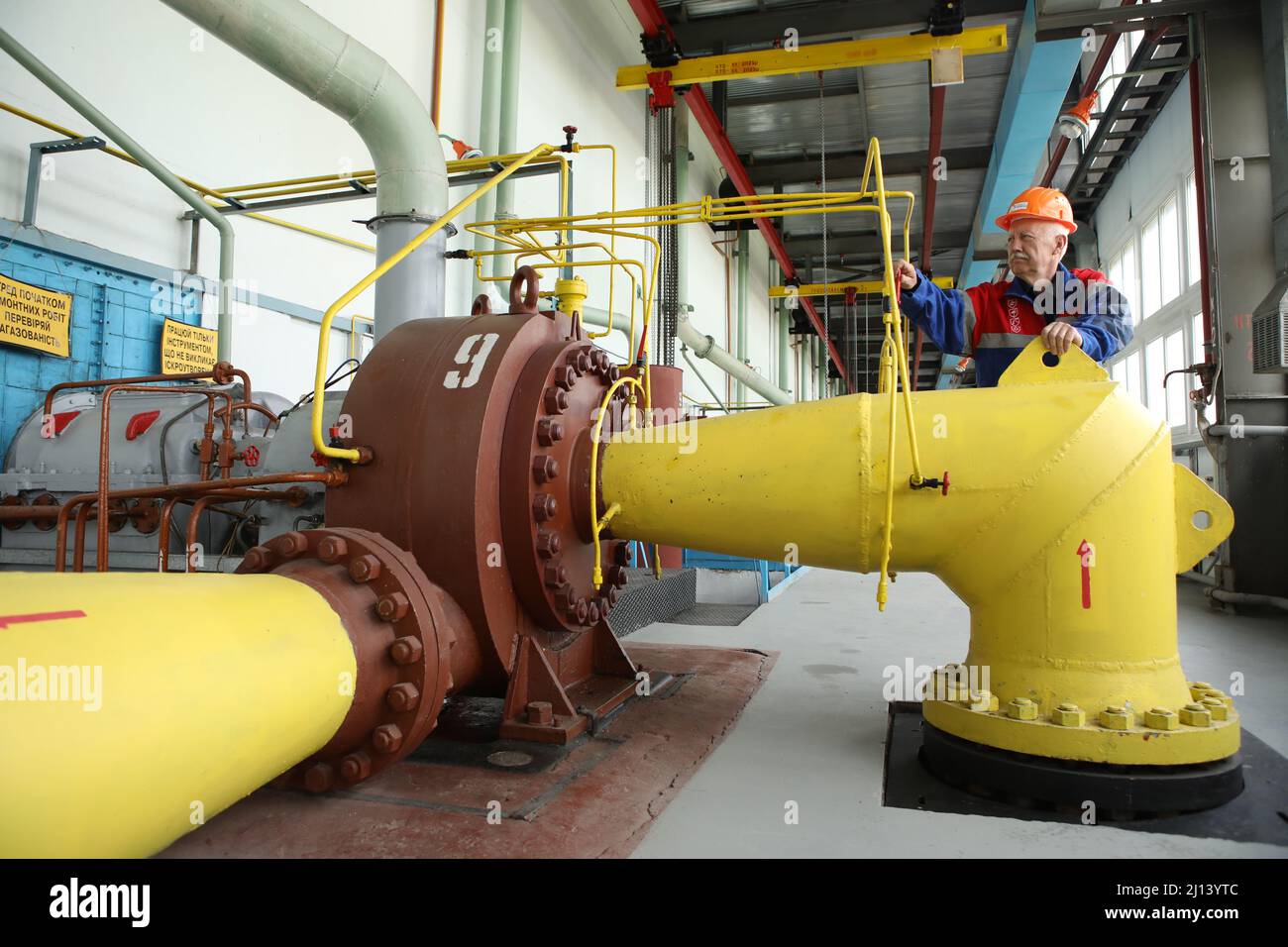 Workers at the oil and gas station. Shut off the gas, control station ...