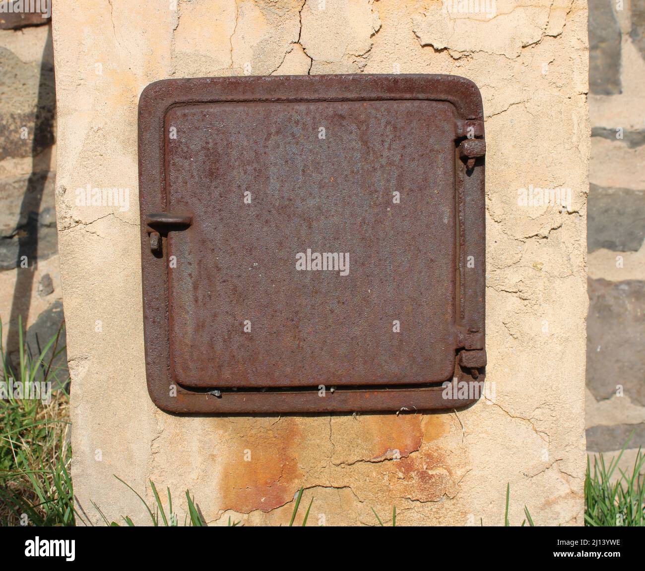 An Old Metal Chimney Clean-Out Door Stock Photo - Alamy