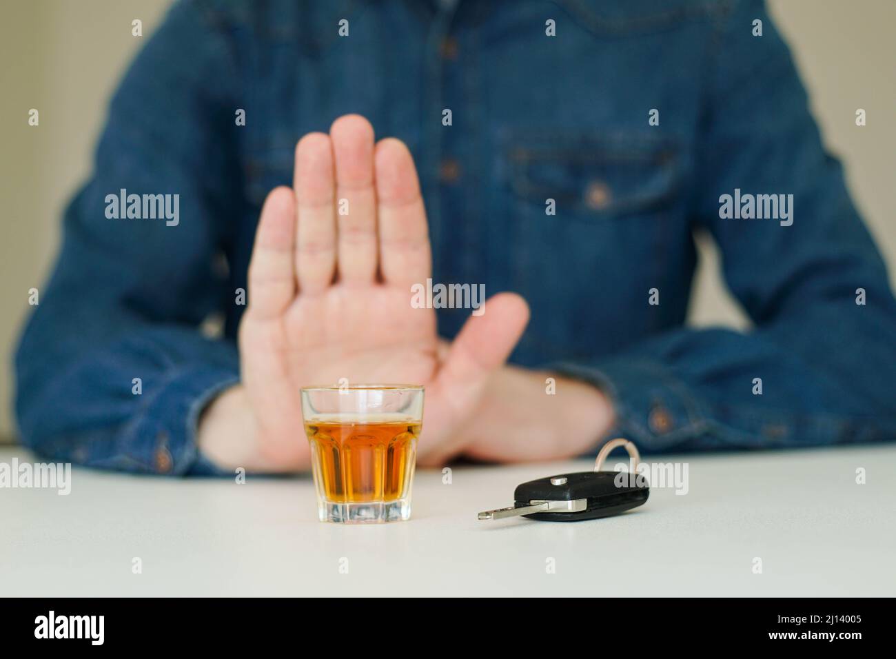 Drink no drive concept. Man showing stop gesture to drunk driving Stock ...