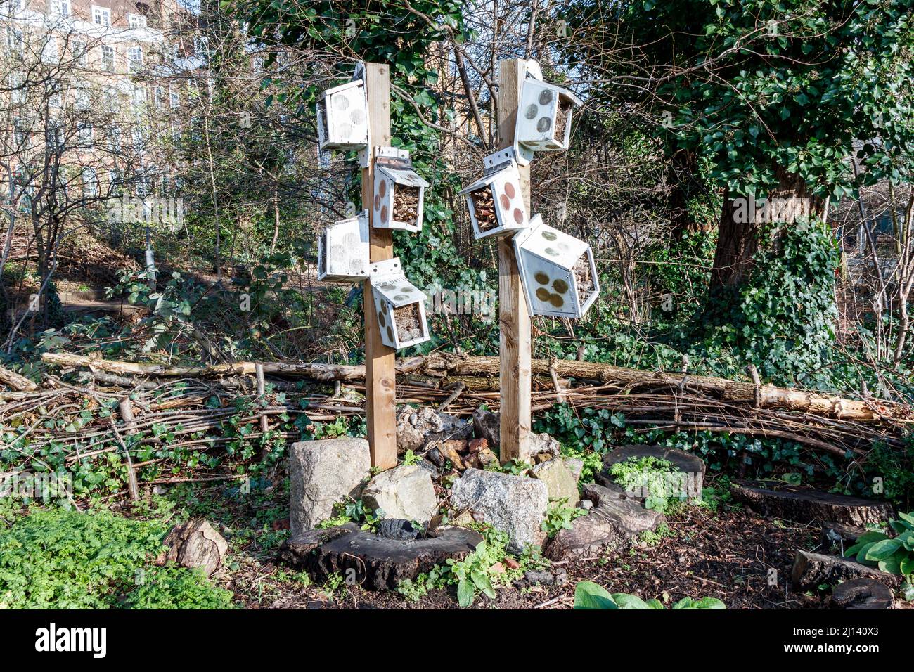 AN 'insect hotel' in Sunnyside Gardens, North London, UK. The boxes ...