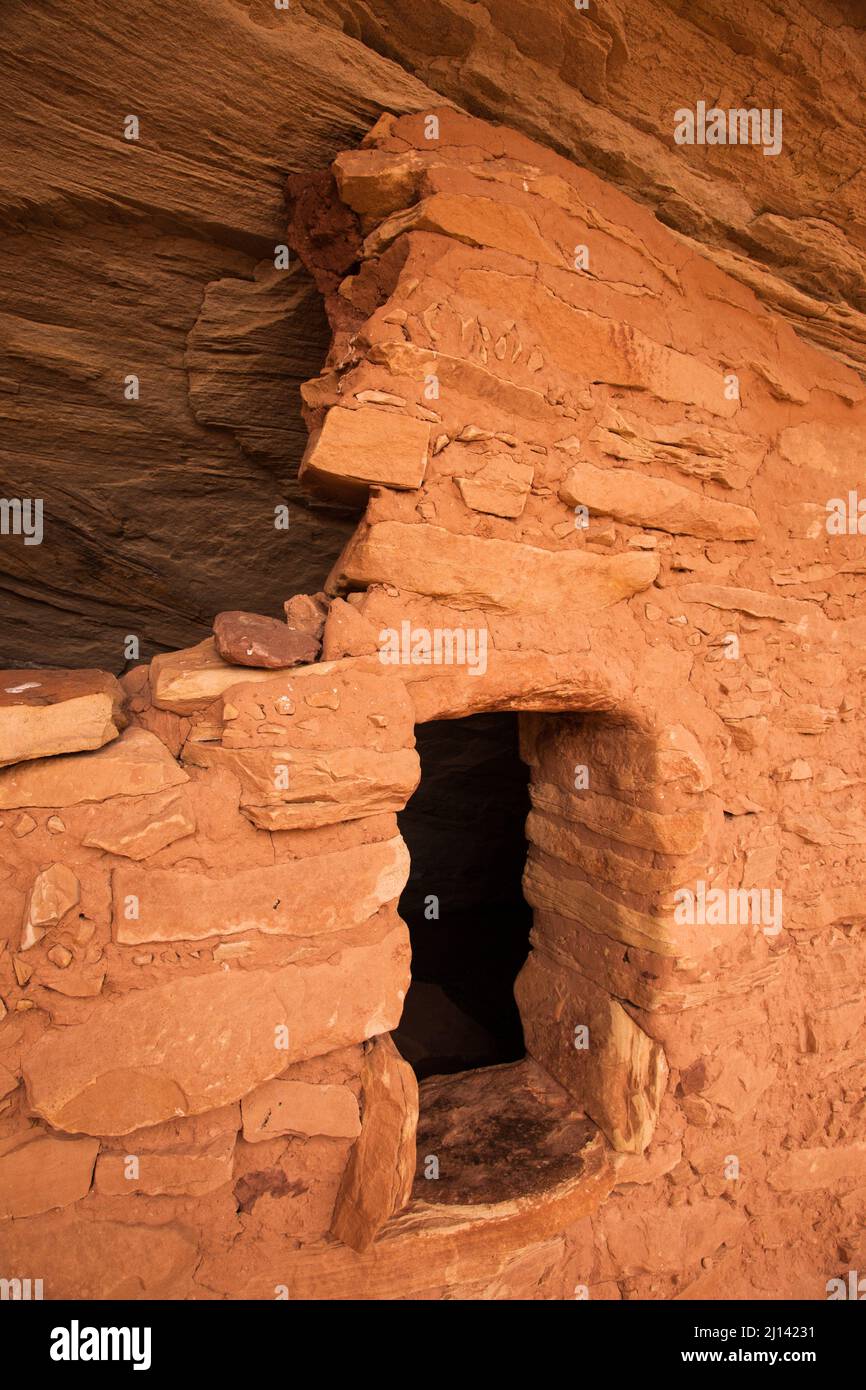 Rust-colored handprints painted above the door of an ancient 1,000 year ...