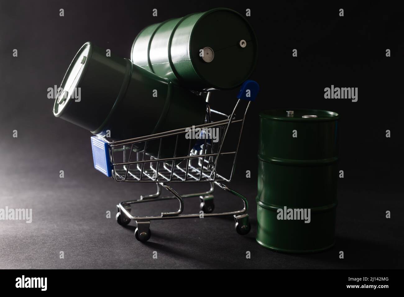 Miniatures toy barrels on a shopping cart Stock Photo - Alamy