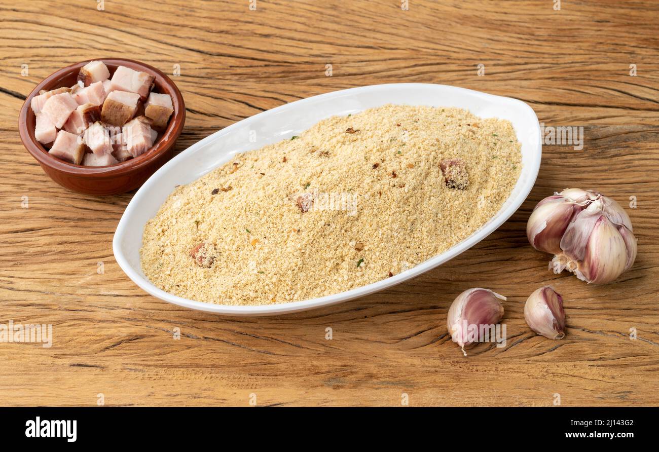 Farofa, typical brazilian manioc flour side dish with seasonings Stock ...