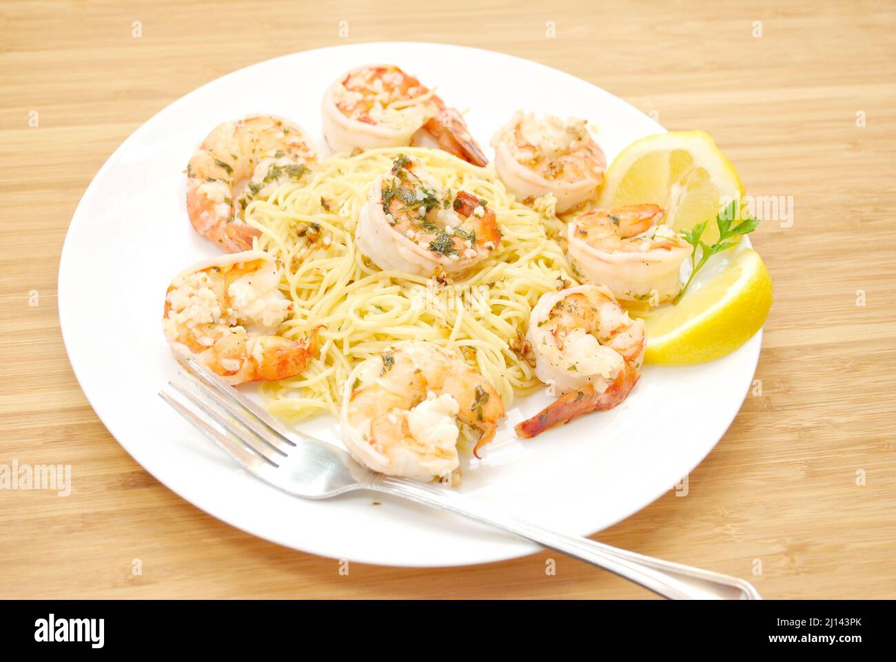 Meal of Jumbo Tiger Shrimp Scampi & Pasta Stock Photo - Alamy