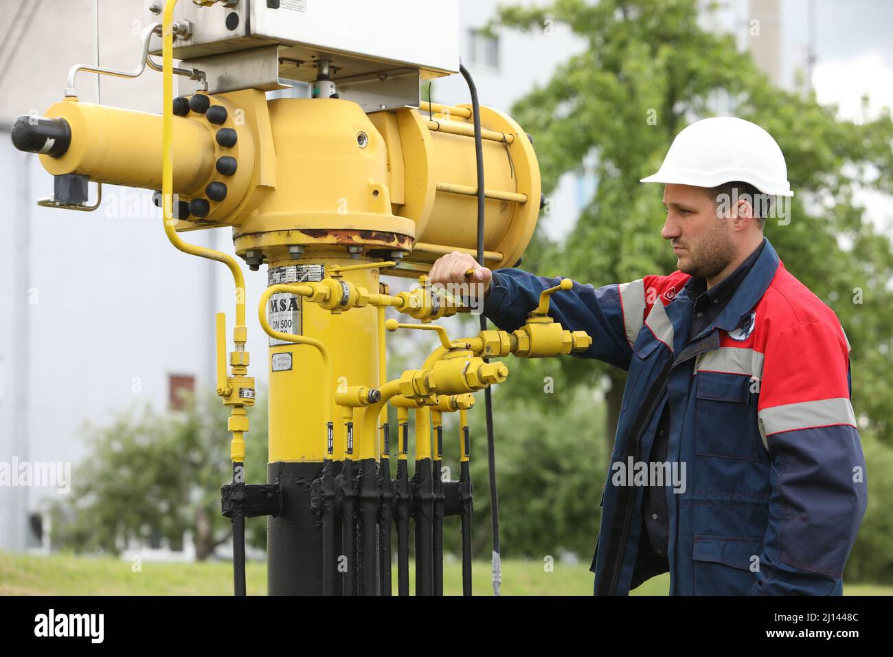 Workers at the oil and gas station. Shut off the gas, control station ...
