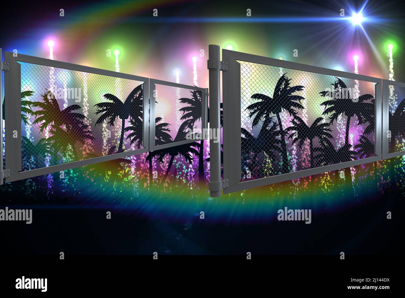 Rainbow lens flare and fence over silhouette of palm trees against ...