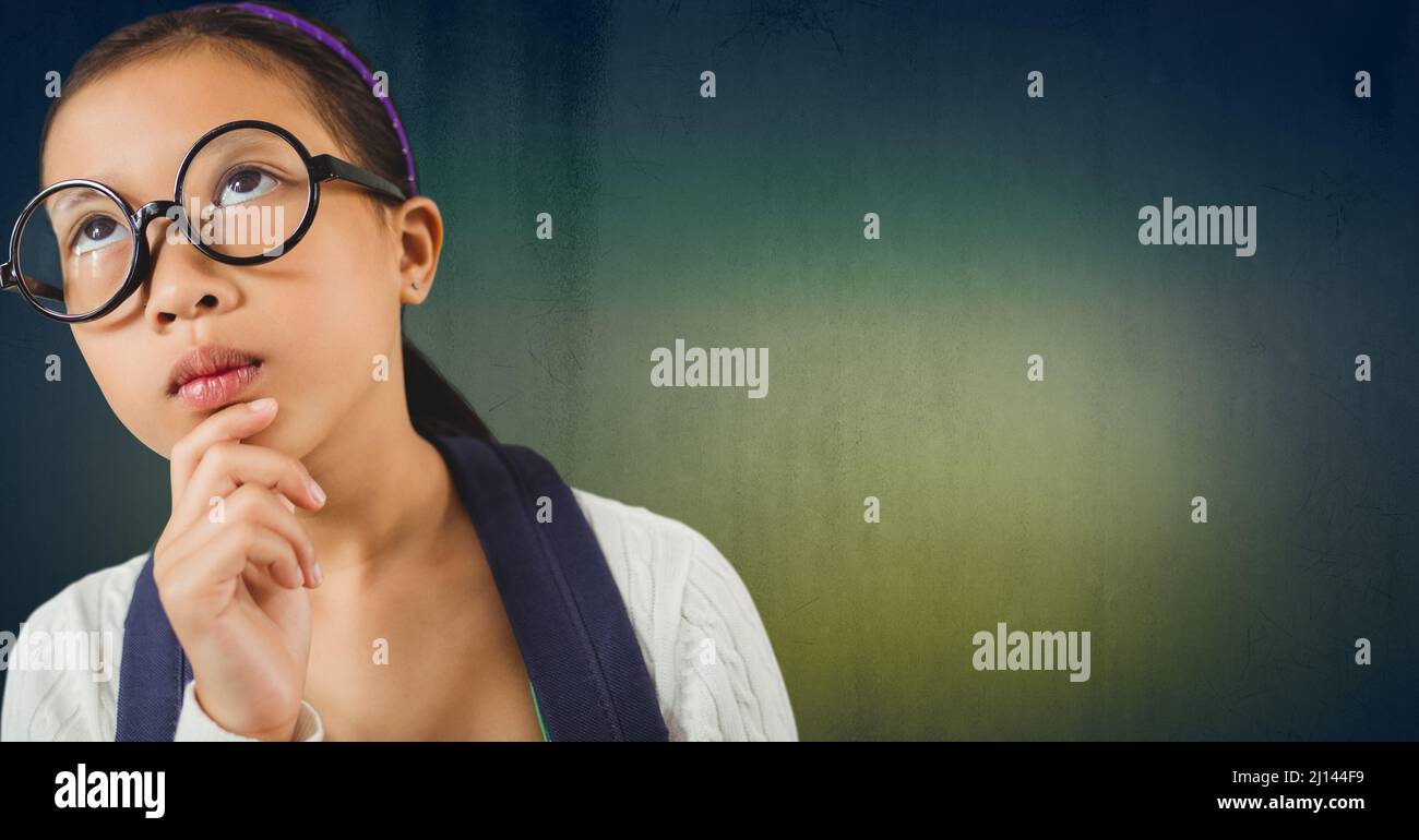 Thoughtful asian girl against copy space on textured green gradient ...