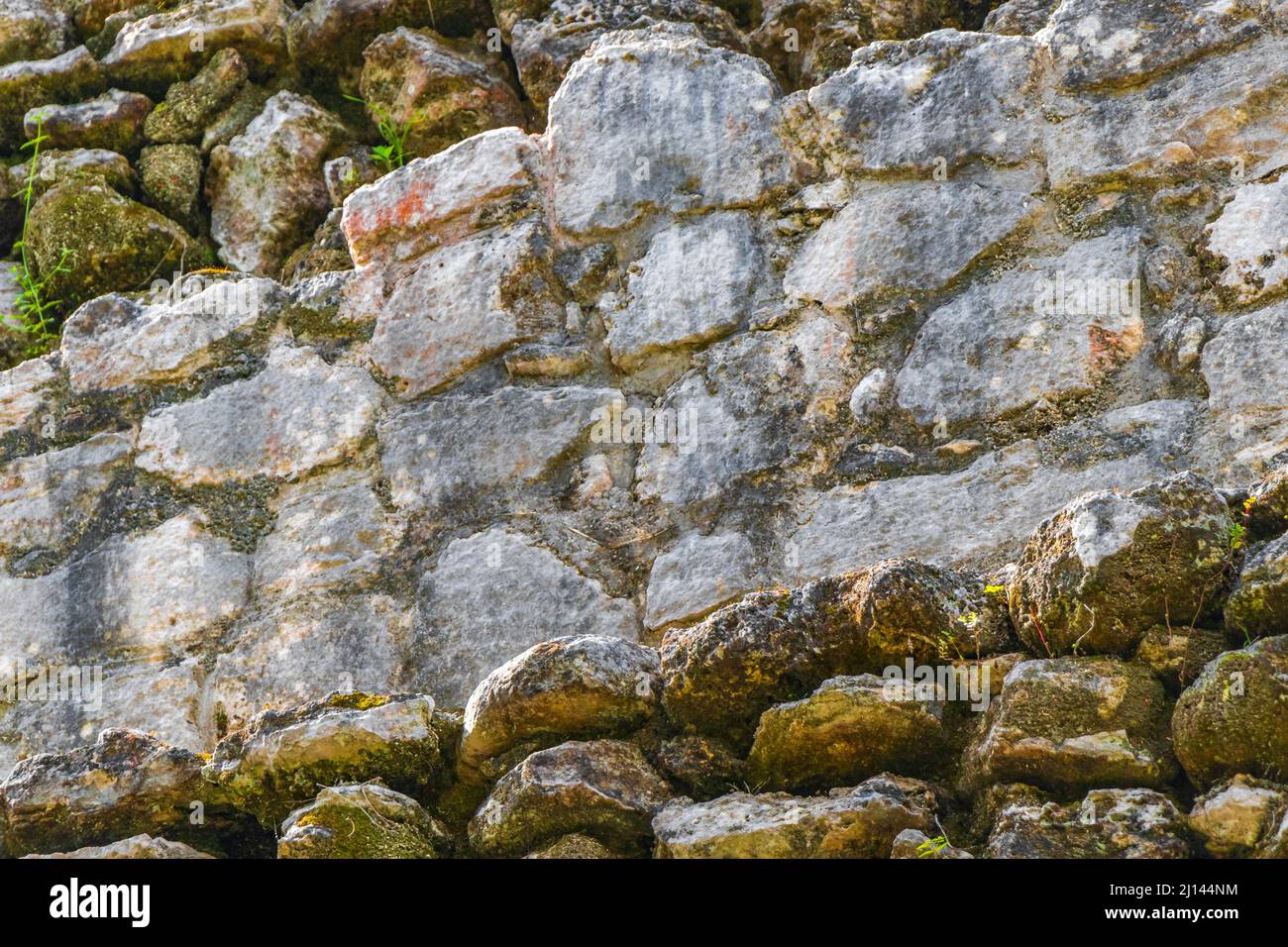 Texture of the ancient Mayan site with temple ruins pyramids and ...