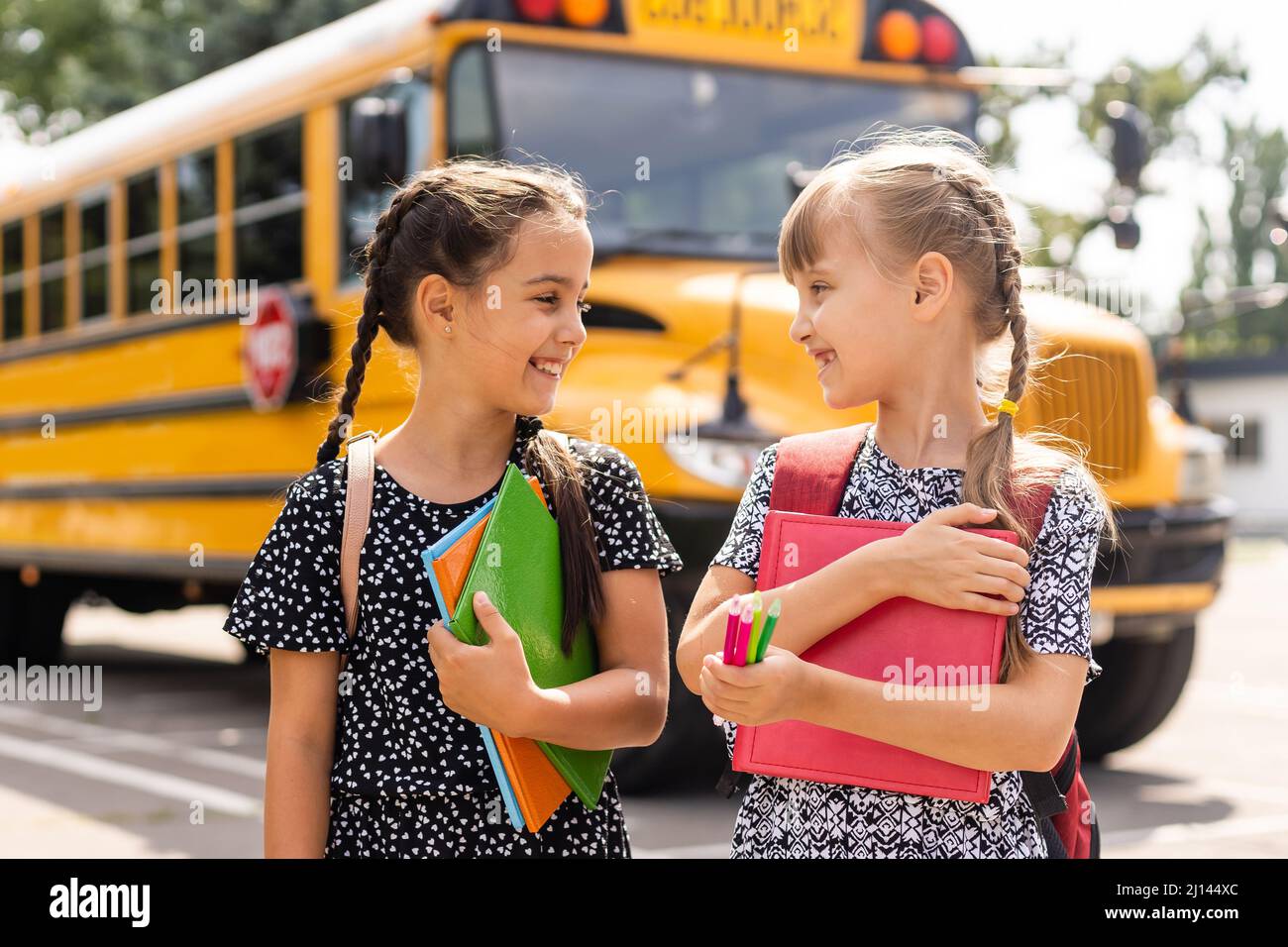 Children running school bus hi-res stock photography and images - Alamy