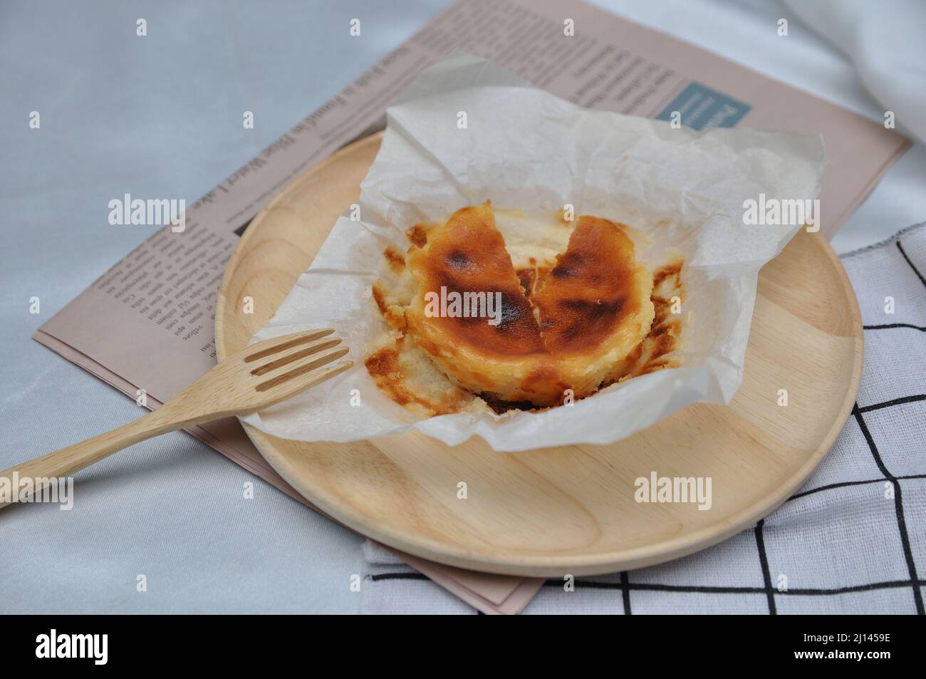 Delicious Cheesecake on a wood dish with wood fork, Cheesecake on a ...