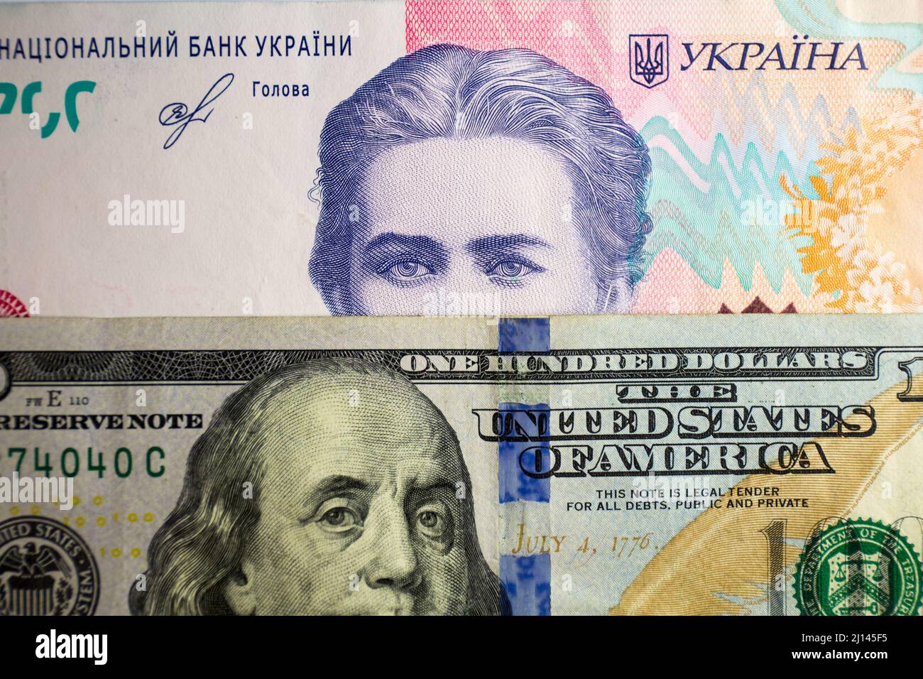 In this photo illustration United States one-hundred-dollar bill and ...