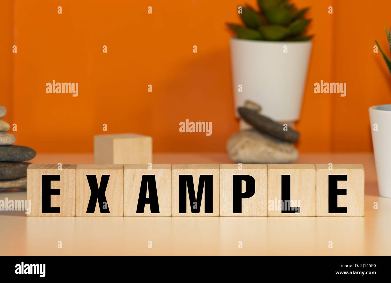 EXAMPLE word made with building blocks isolated on white Stock Photo ...