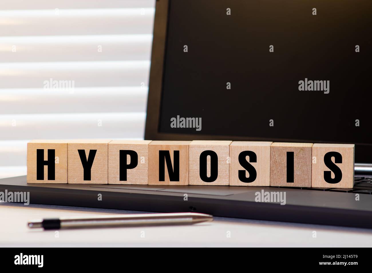 the word of HYPNOSIS wood tiles concept Stock Photo - Alamy