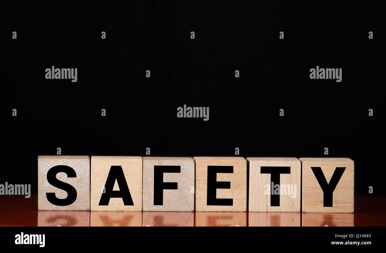 safety word written on wood block, business concept Stock Photo - Alamy