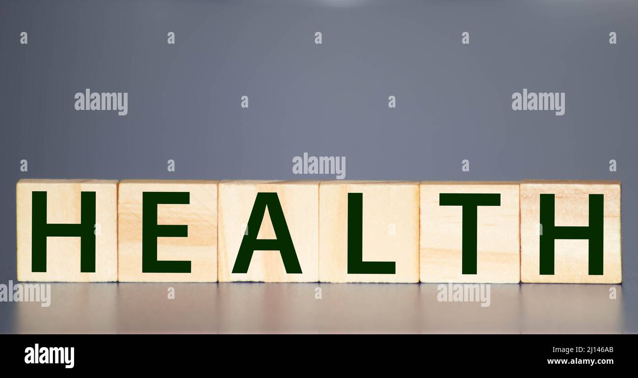 Health sign made of wood on a natural desk Stock Photo - Alamy