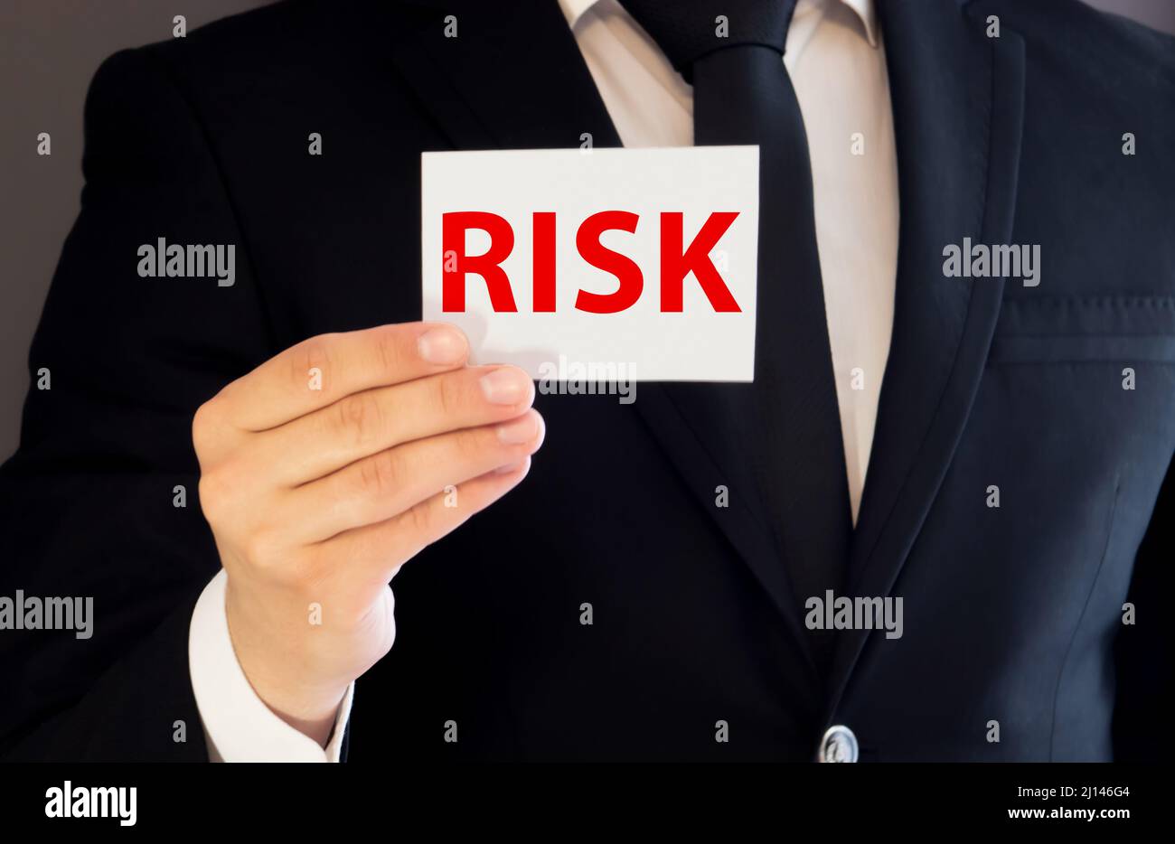 RISK - word written in red letters on a yellow background Stock Photo ...