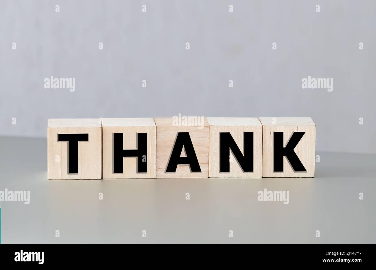 thanks word background on wood blocks concept Stock Photo - Alamy