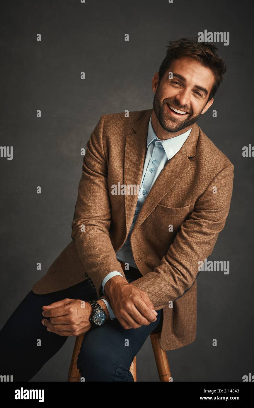 Self confidence is the best outfit. Studio shot of a handsome young man ...
