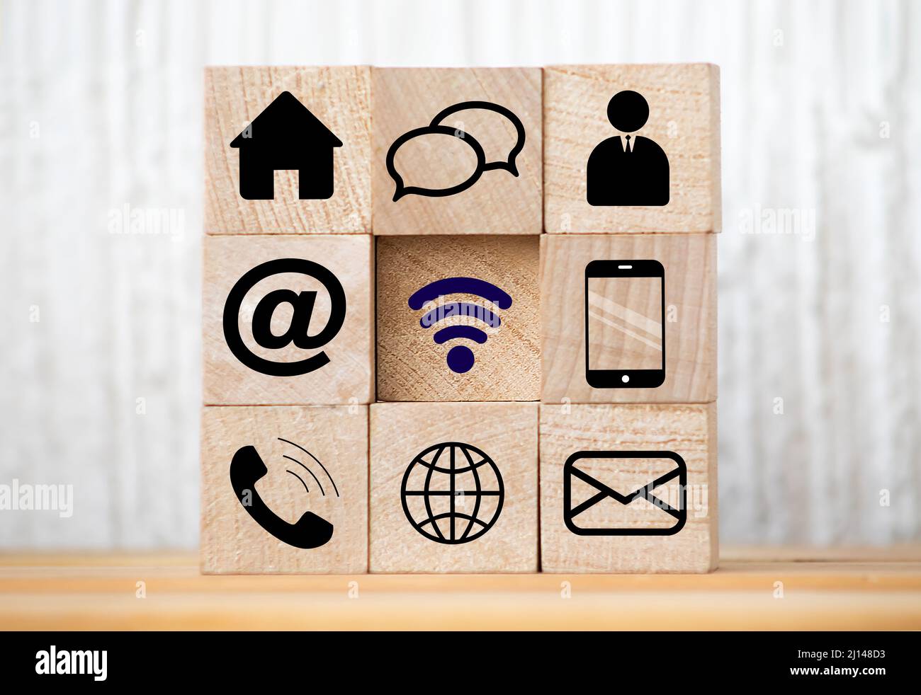 Wooden block cube symbol telephone, email, address and mobile phone ...