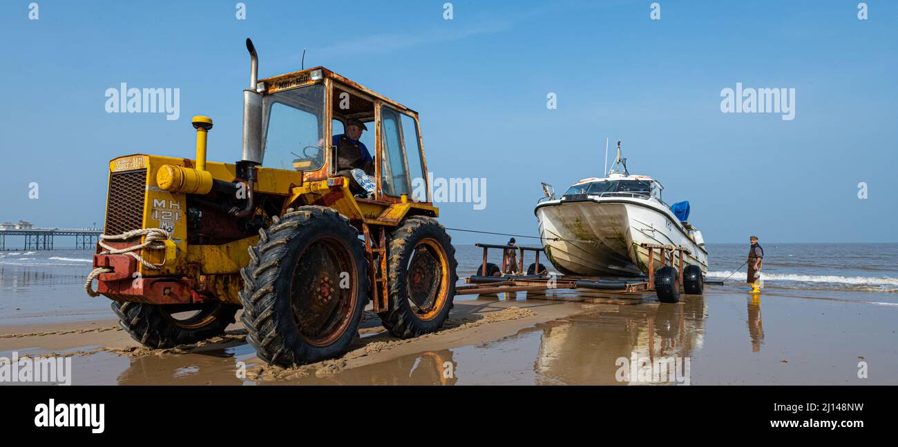 Tractors on cromer beach Norfolk Stock Photo - Alamy