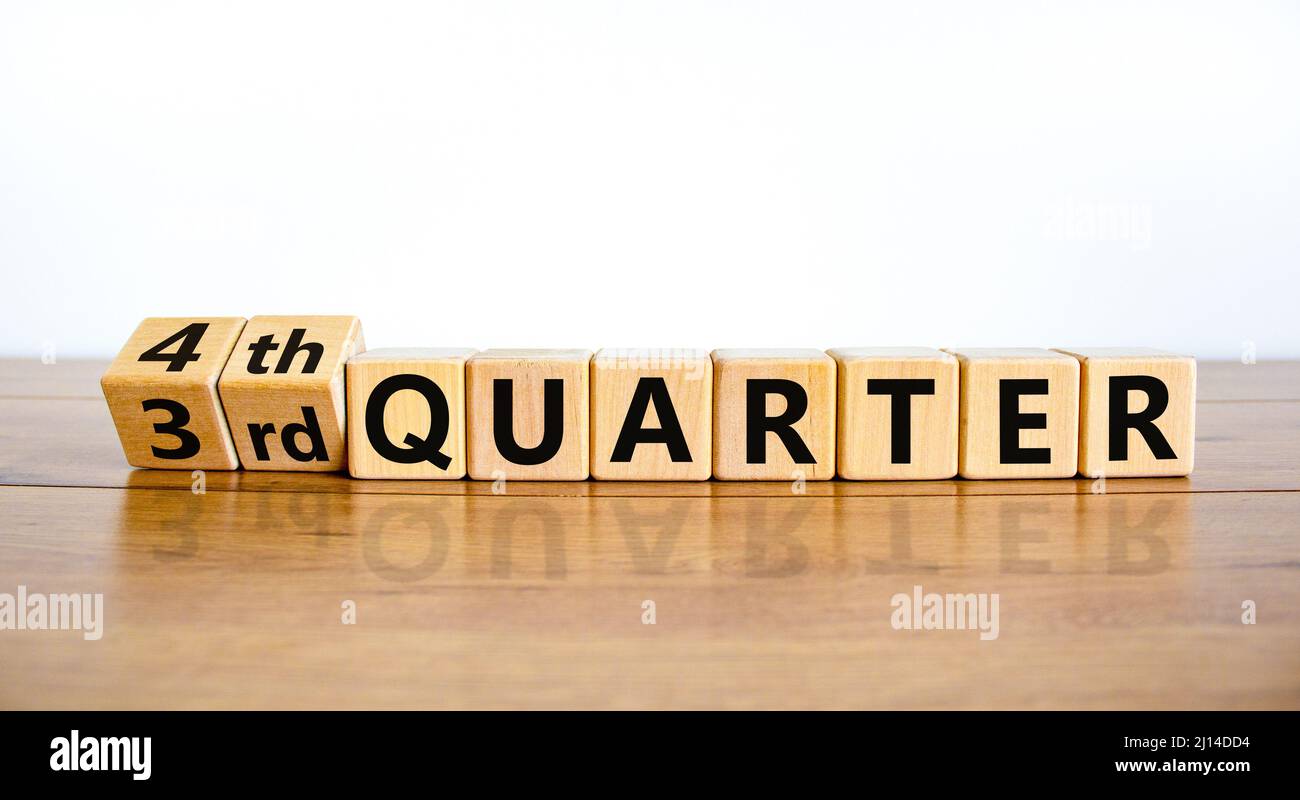 From 3rd third to 4th forth quarter symbol. Turned wooden cubes and ...