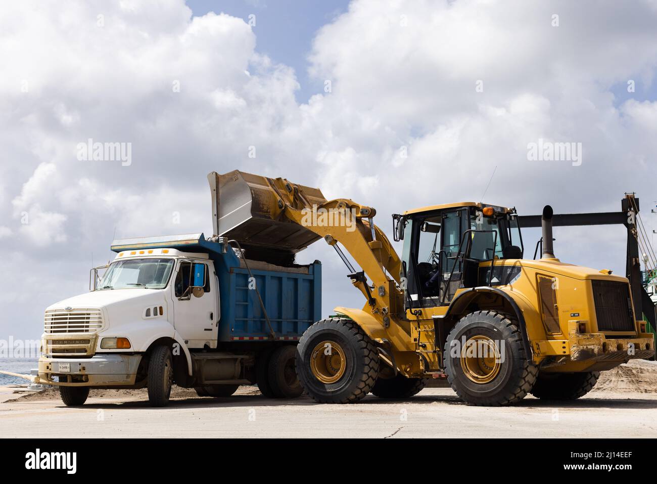 Truck with black soil. Automotive equipment loading black soil Stock ...