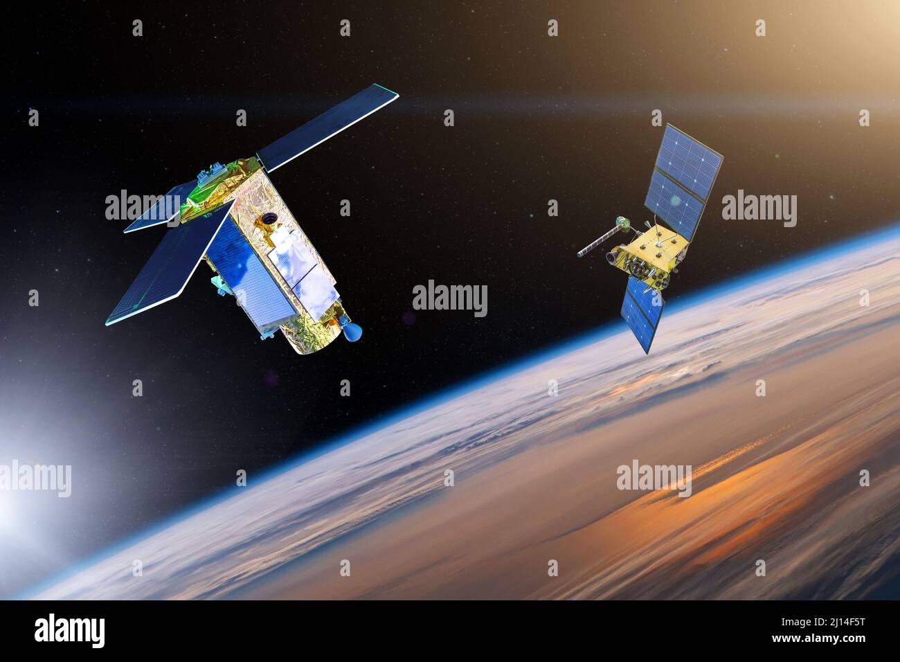 Two communications research satellites in orbit of the planet earth ...