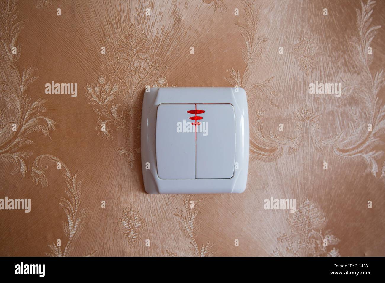 a light switch in the apartment with indicator Stock Photo - Alamy
