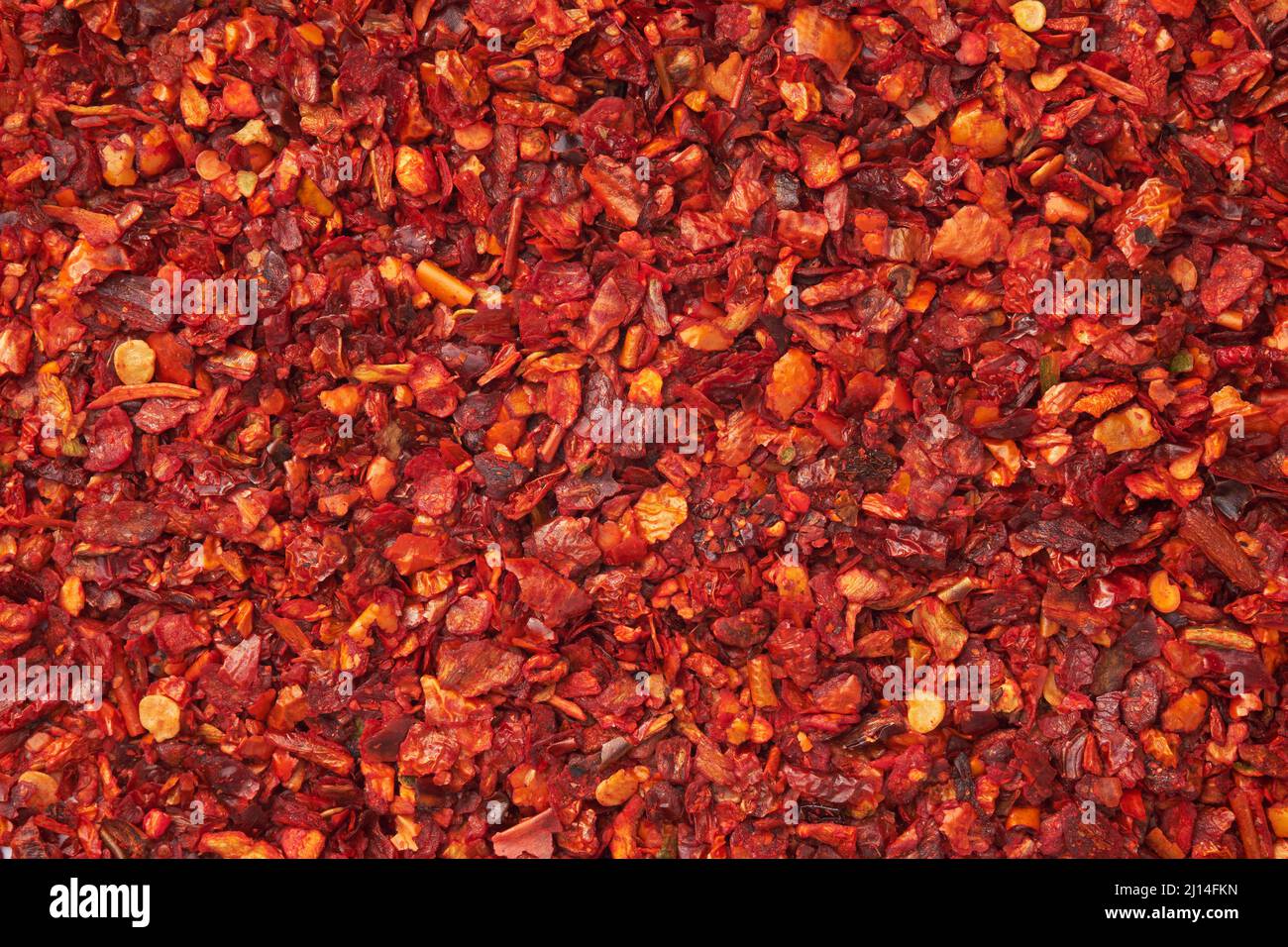 Dried paprika and hot pepper flakes. Organic spices background. Pepper ...