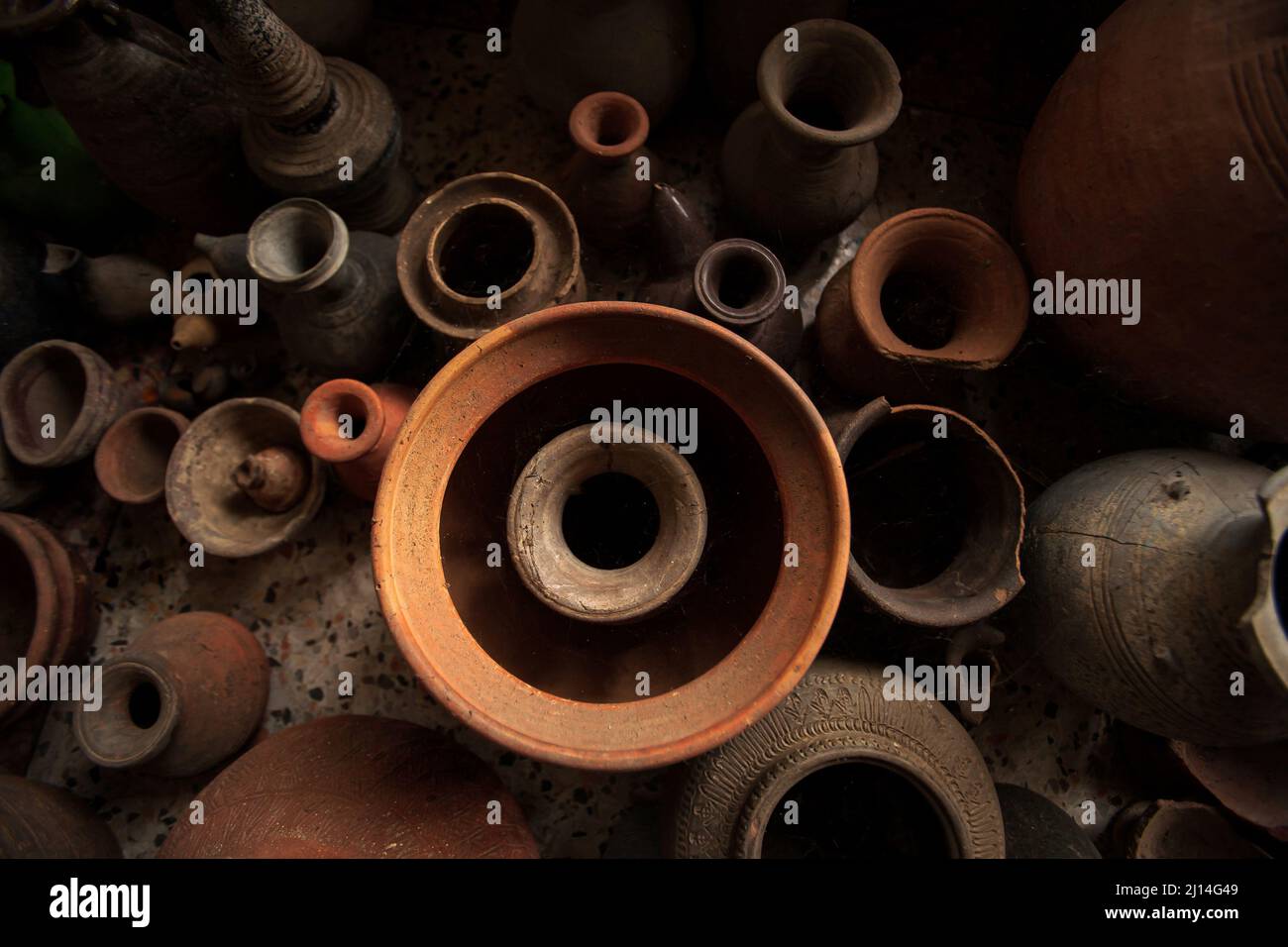 A group of ancient pottery vessels was displayed at the local museum of ...