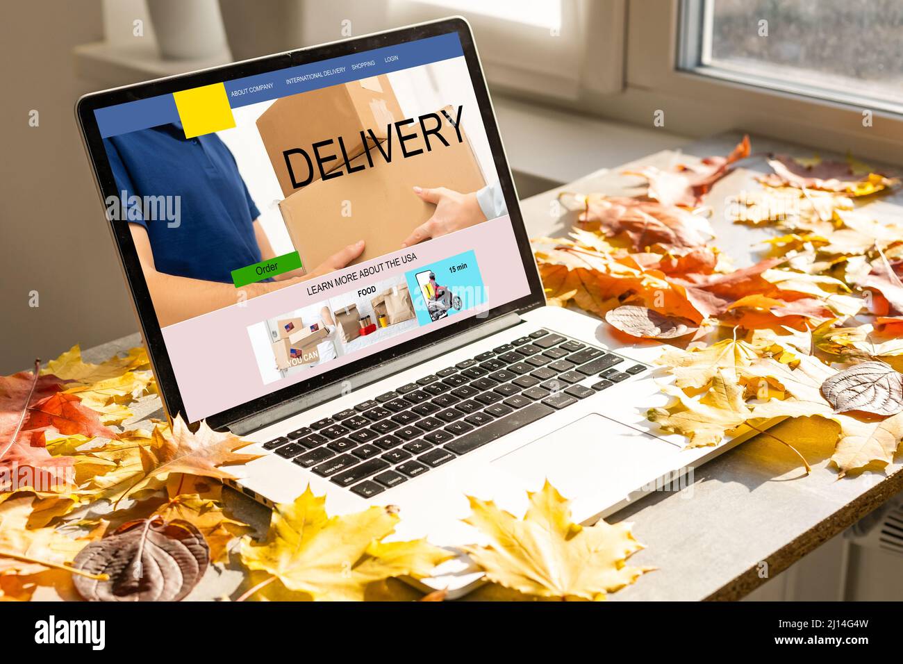 Online shopping. laptop with banner delivery Stock Photo - Alamy