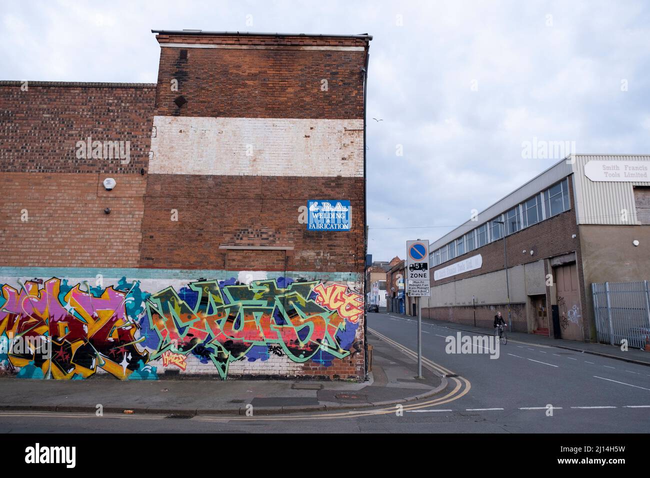 Graffiti covered old industrial factory and warehouse buildings in the ...