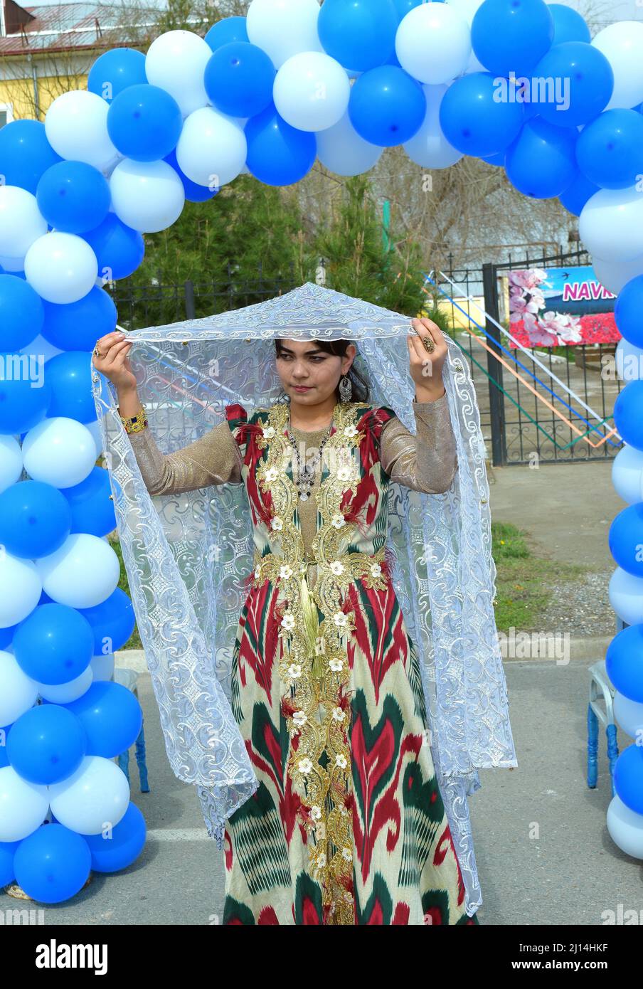 Uzbek young women in national costumes at Navruz spring festival Stock ...