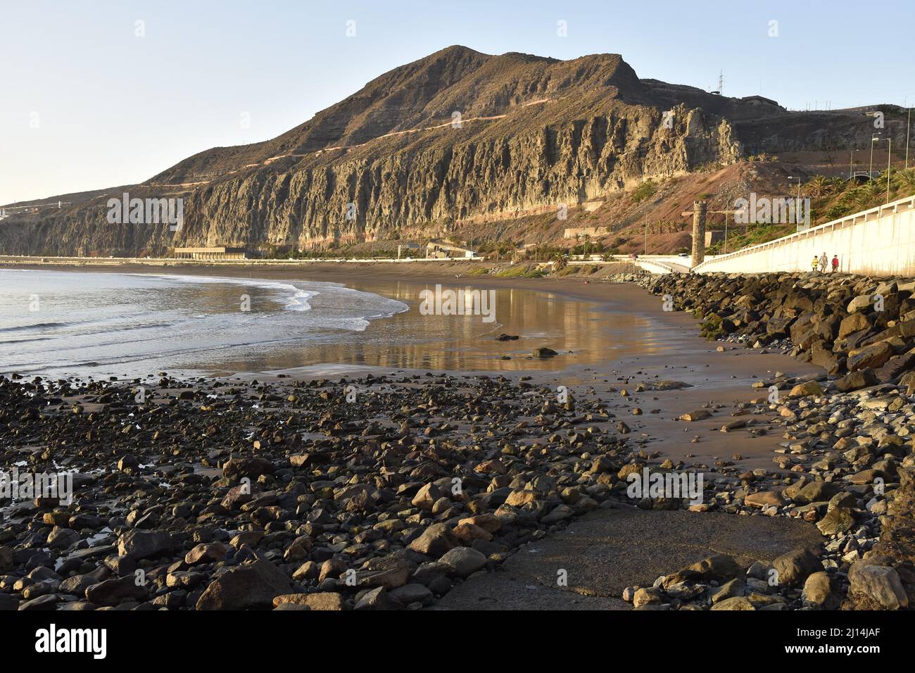 Rocky Playa de la Laja beach with dark volcanic sand located near Las ...